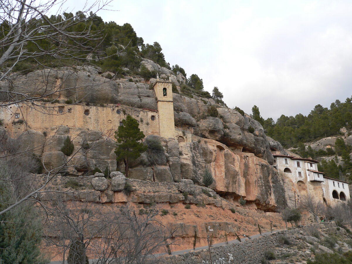 The Santuario de la Virgen de la Balma sanctuary built into a rocky cliff face in Castellon Spain