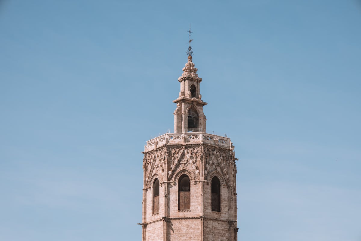 The Miguelete bell tower rising above Valencias old town showcasing Gothic architecture against a clear sky