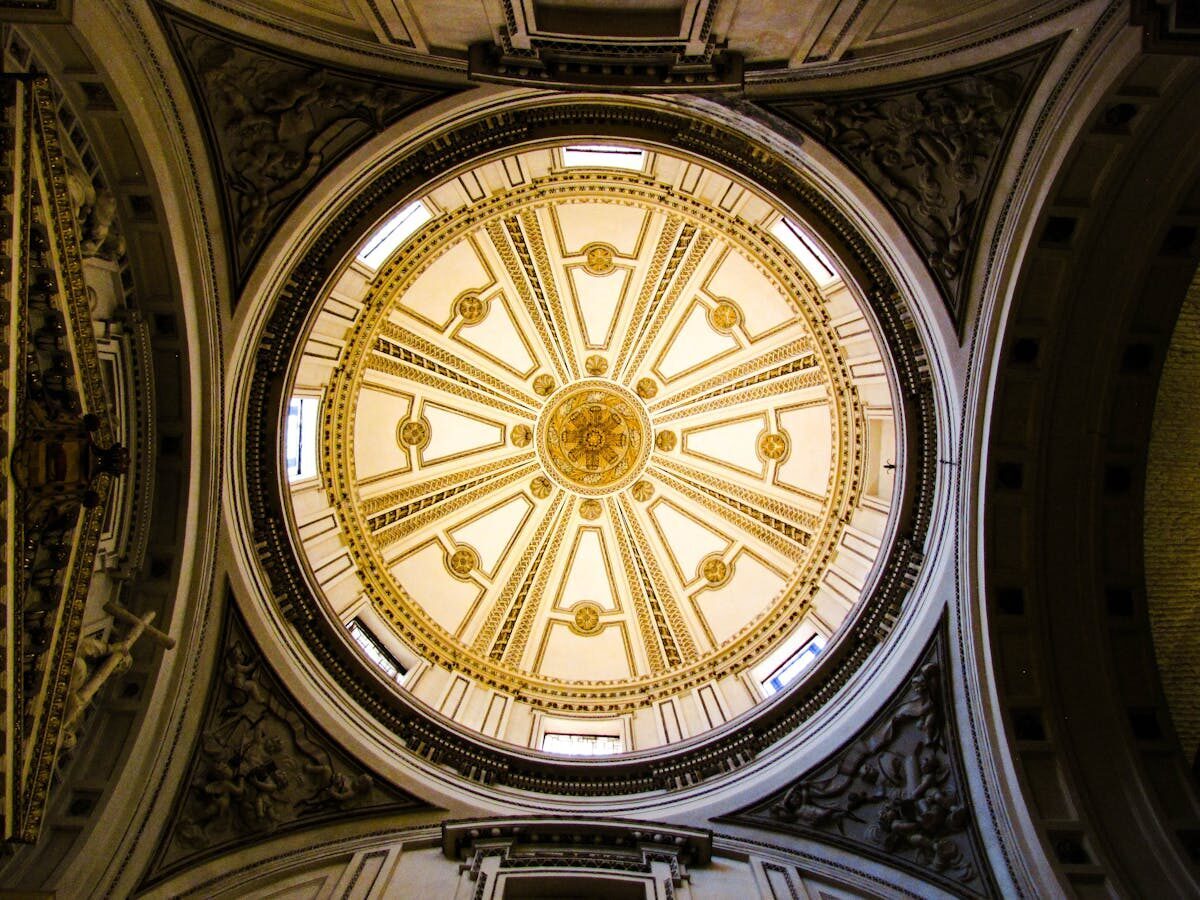 Ornate painted dome ceiling inside Valencia Cathedral