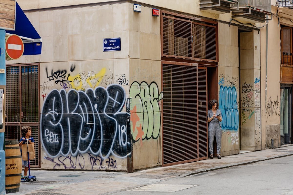 Street art and urban life on a Valencia corner