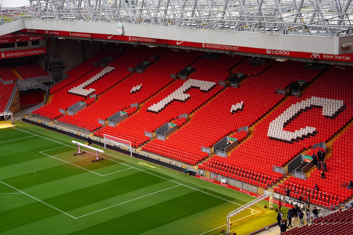 Anfield Stadium seating with LFC letters visible across the iconic Kop stand