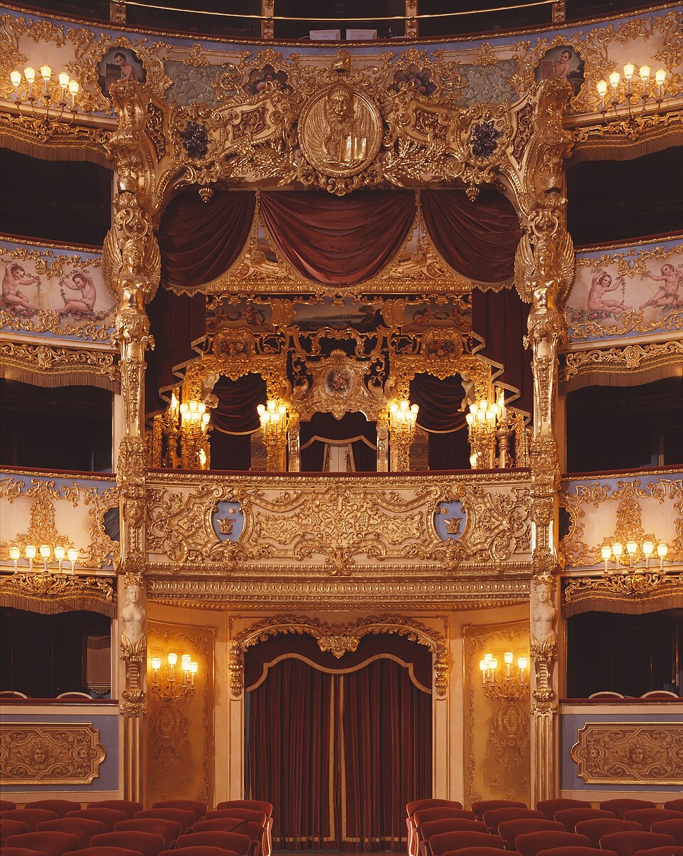 The ornate royal box at Teatro La Fenice decorated in gold leaf with red velvet
