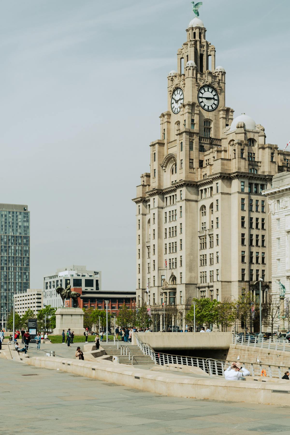 The Royal Liver Building in Liverpool under a clear blue sky