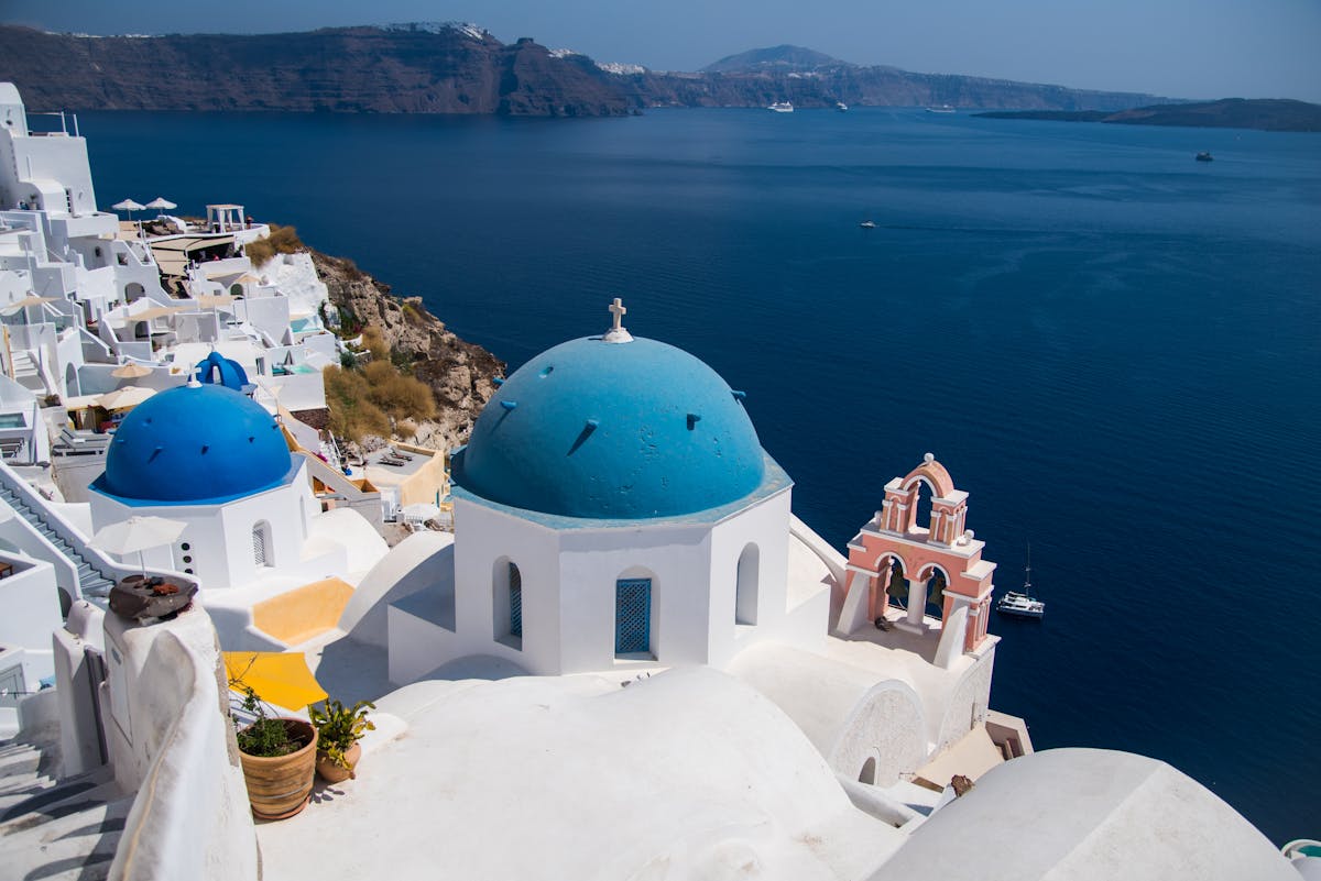 Oia blue domes overlooking caldera