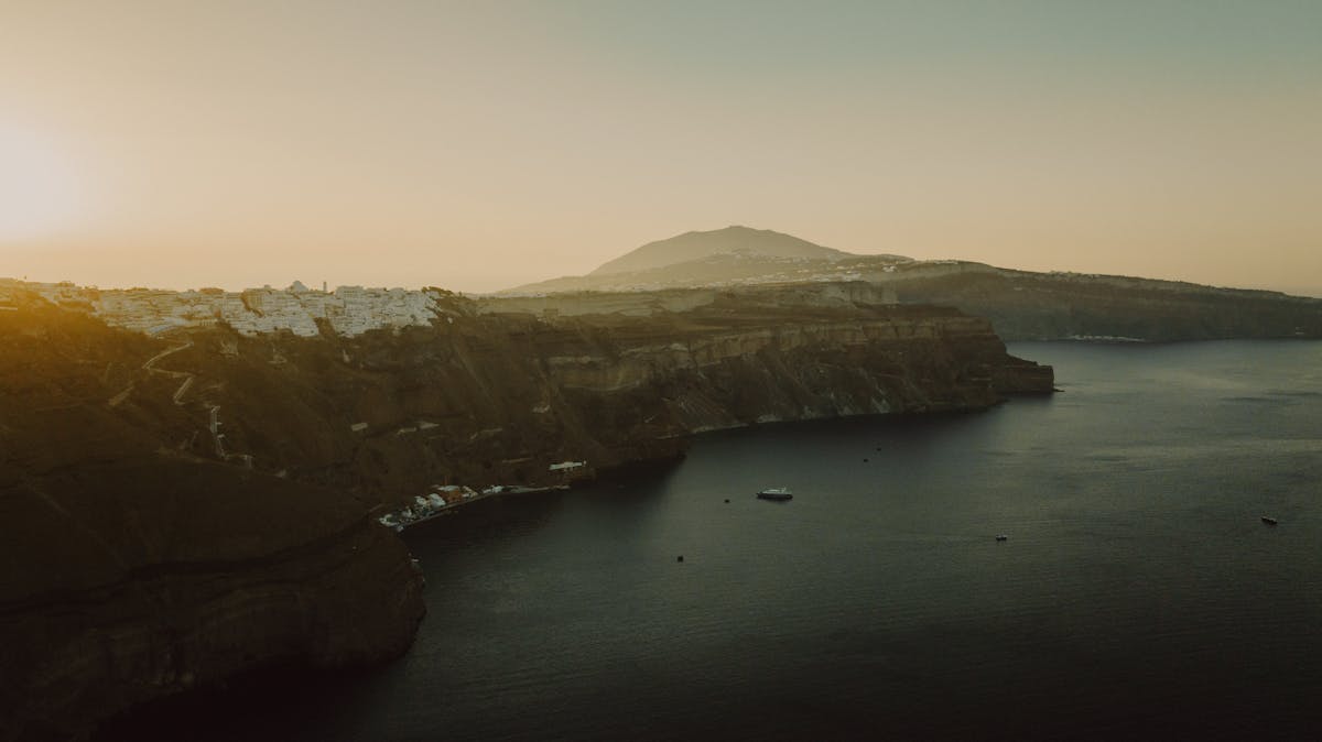 Dramatic cliffs Santorini sunset