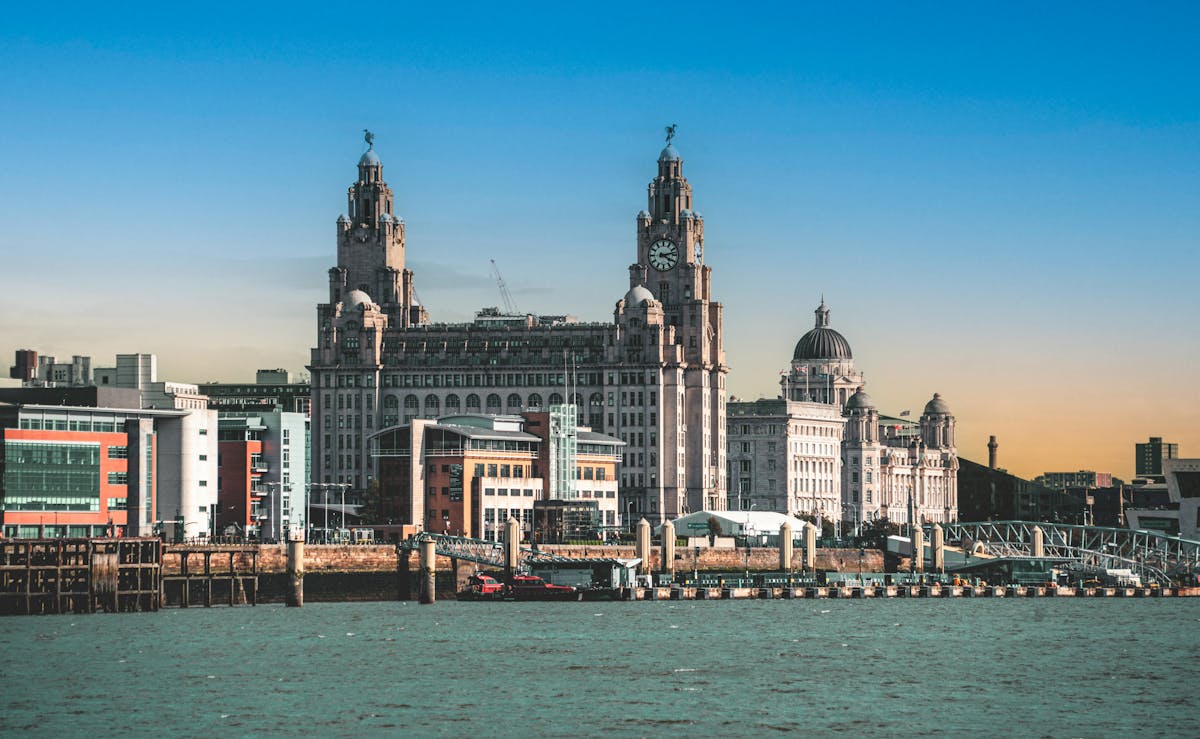 The Liver Building and Liverpool waterfront at golden hour sunset