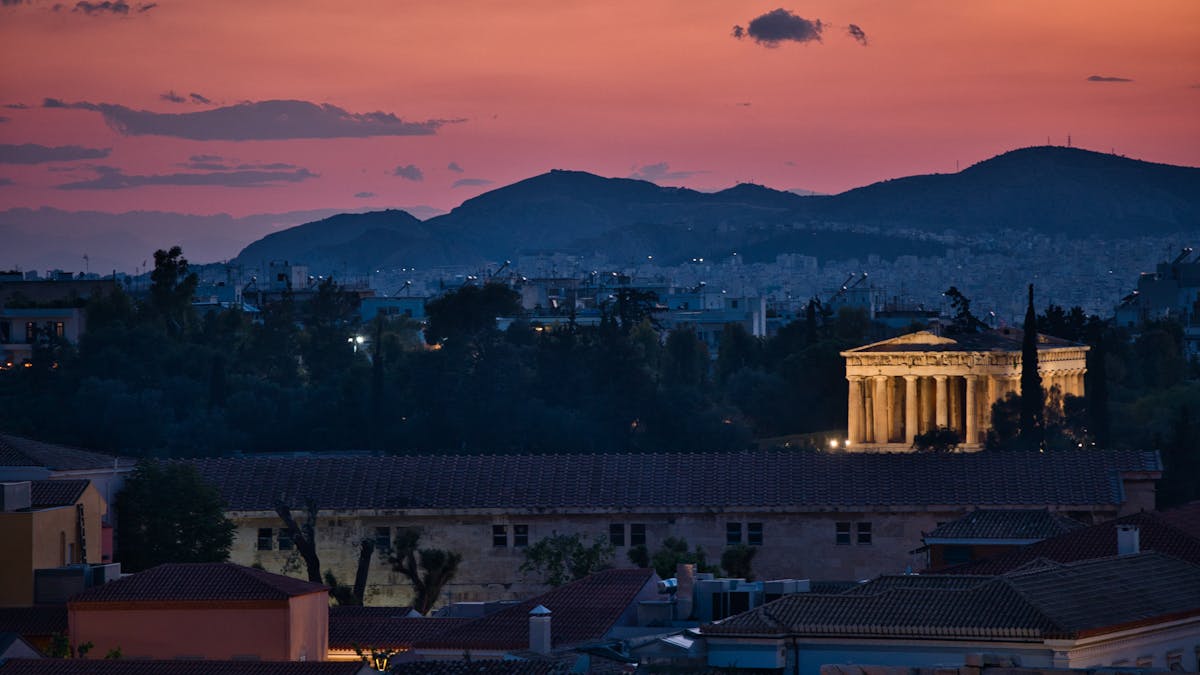 The Ancient Agora in Athens illuminated at sunset