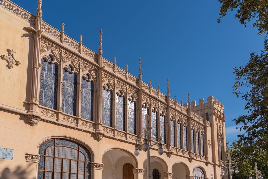 Gothic stone building facade in Valencia old town on sunny day