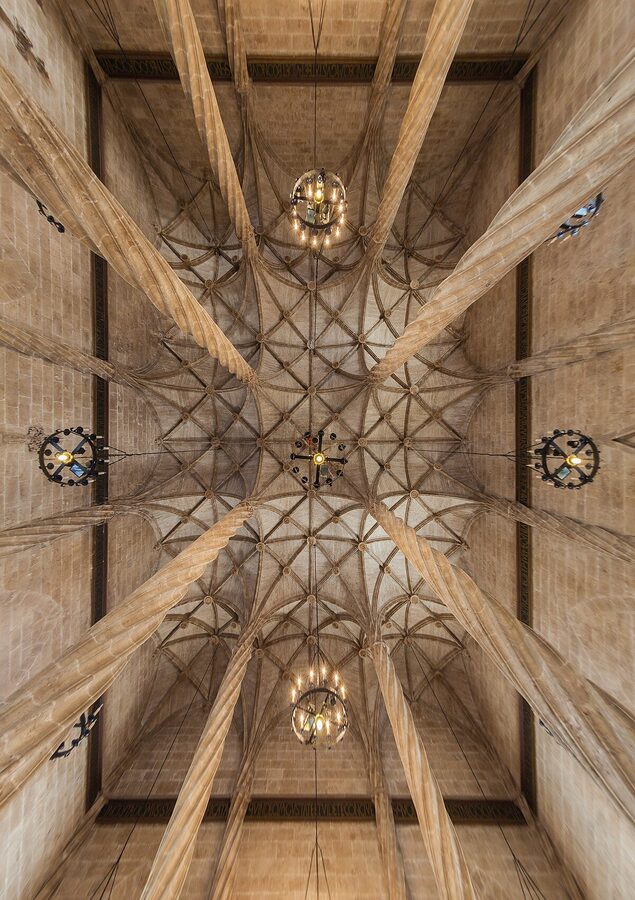 Twisted stone columns inside La Lonja de la Seda Silk Exchange in Valencia