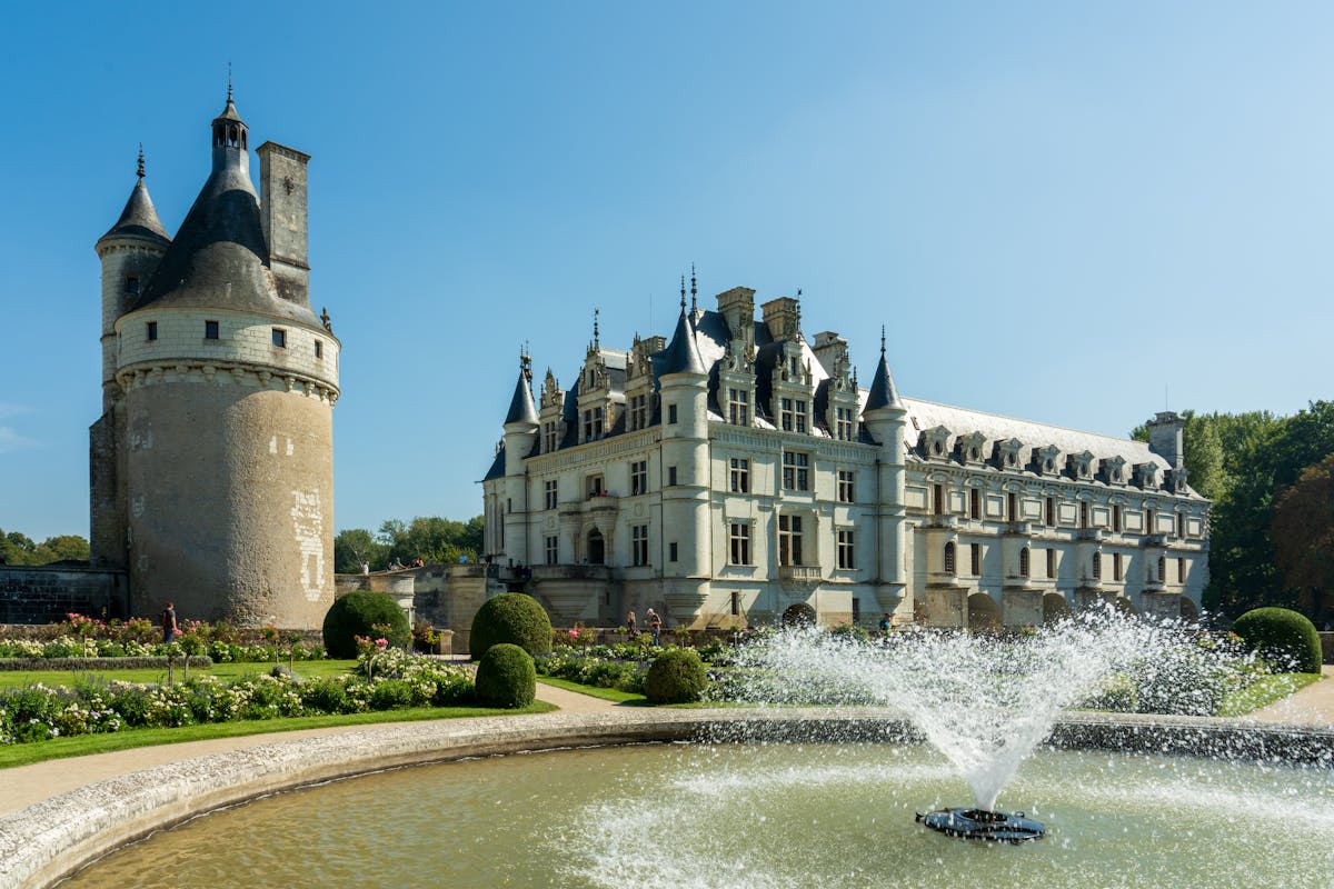 Chenonceau Castle with fountain and formal gardens