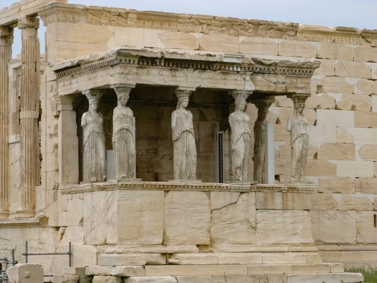 Detailed close-up of Caryatid statues on the Erechtheion porch