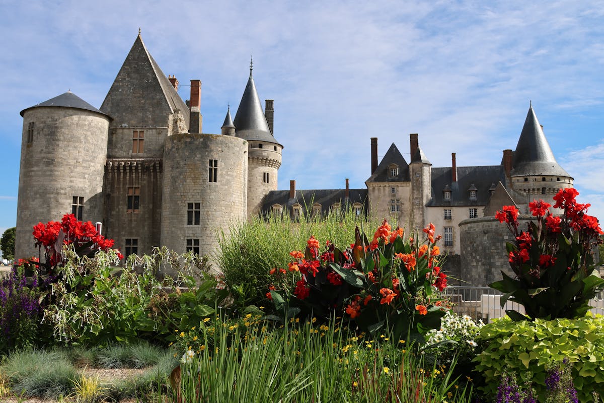 Historic Sully-sur-Loire castle with colourful gardens