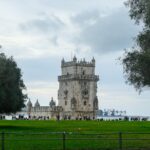 The Belem Tower rising from the banks of the Tagus River in Lisbon, Portugal