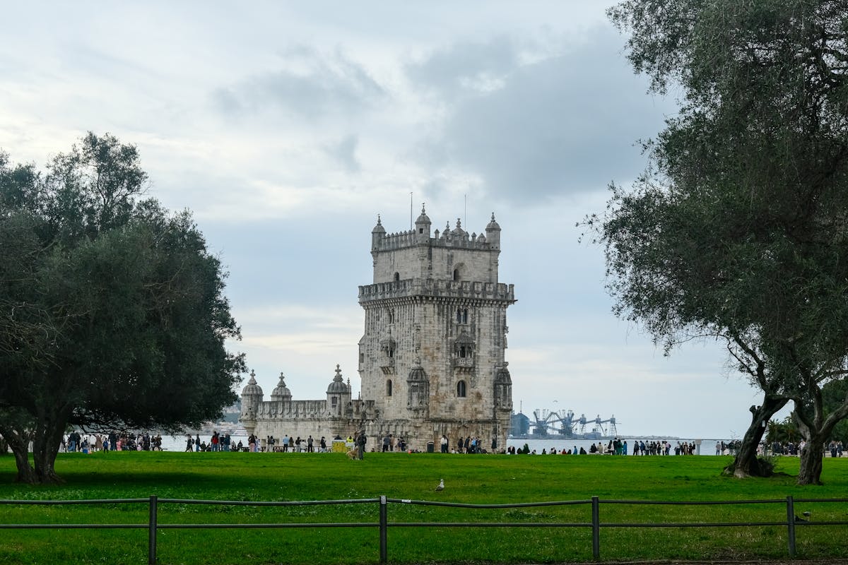 The Belem Tower rising from the banks of the Tagus River in Lisbon, Portugal