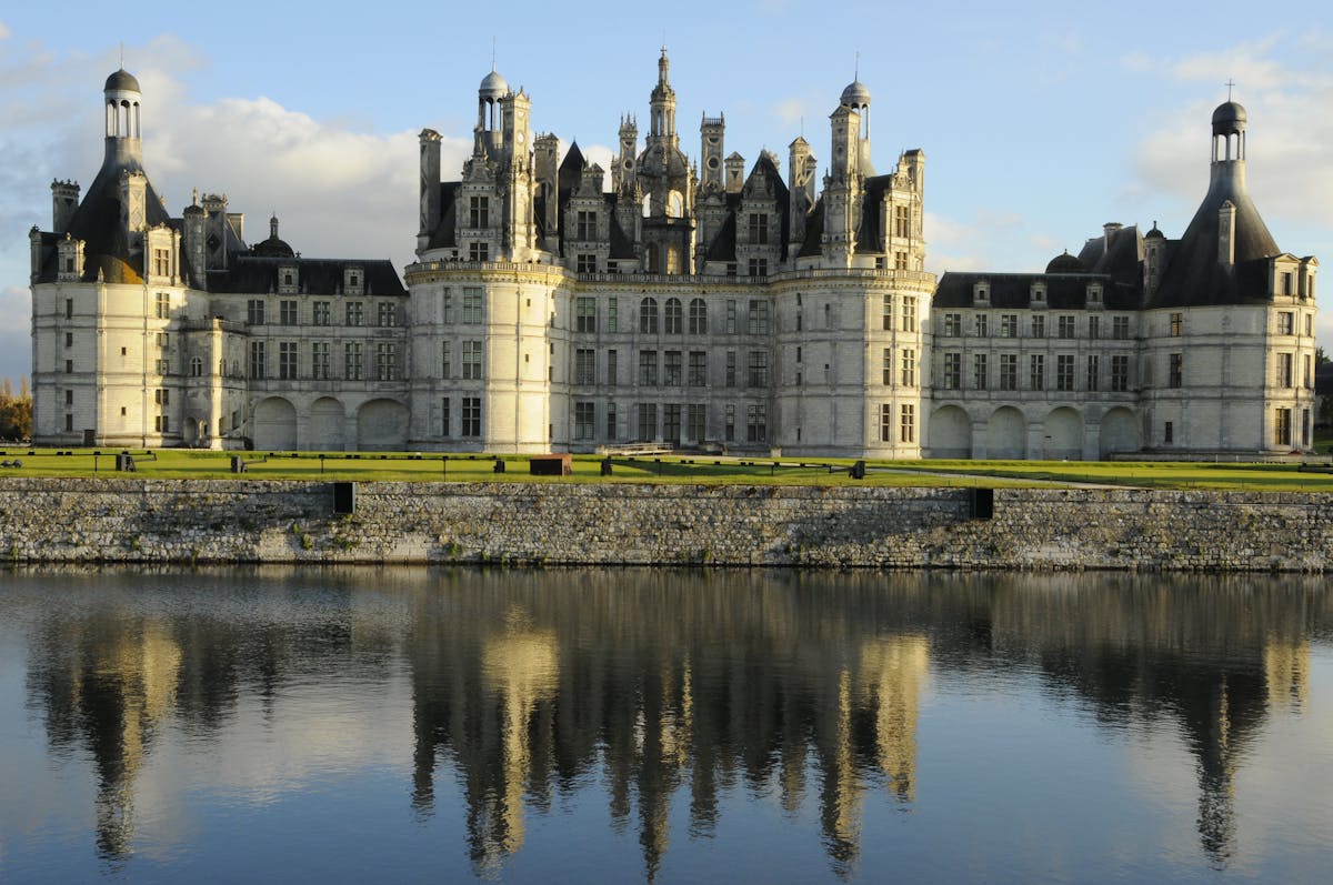 Chateau de Chambord reflected in still water