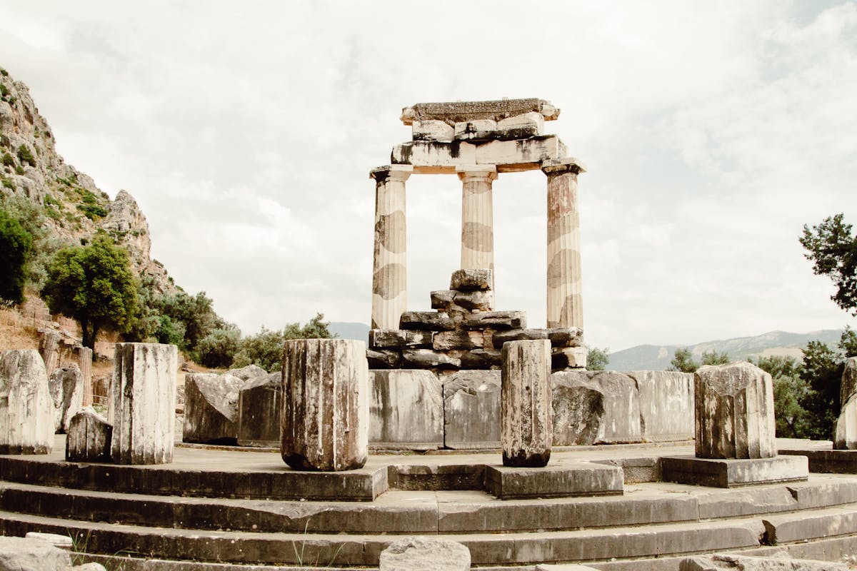 The circular Tholos ruins at the sanctuary of Athena Pronaia in Delphi