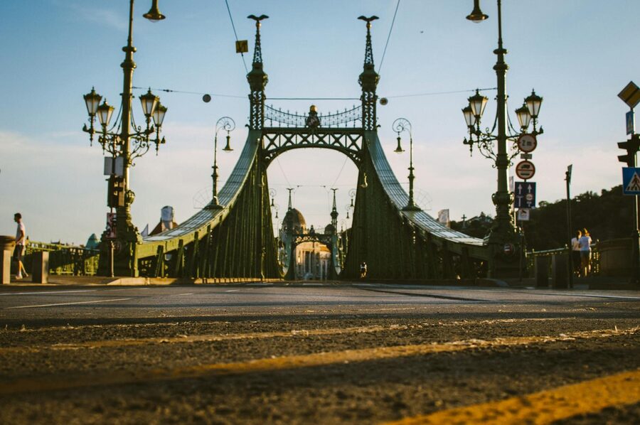 Low angle view of Liberty Bridge in Budapest during sunset