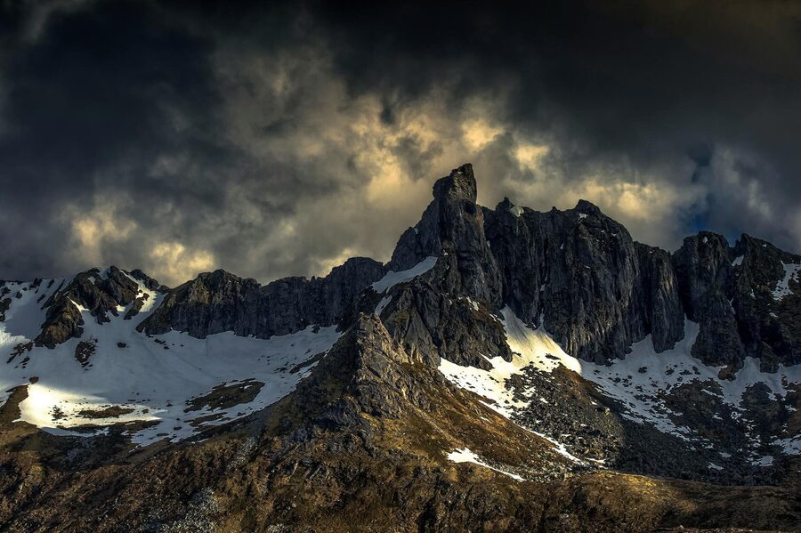 Norwegian fjord near Bergen with dramatic clouds overhead