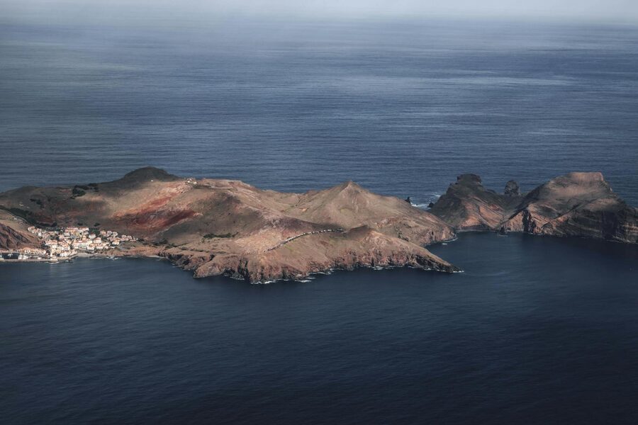 Aerial photograph of Madeira island surrounded by Atlantic Ocean