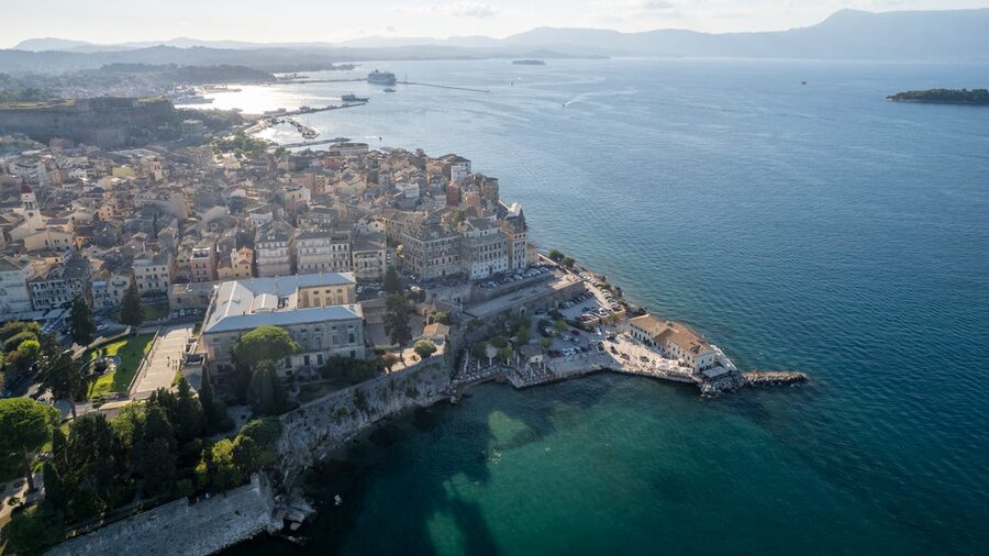 Aerial shot of Corfu's historic old town and coastline, Greece.