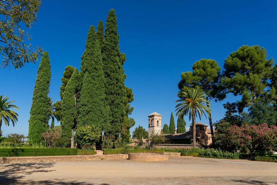 Lush gardens and historic architecture of the Alhambra in Granada Spain