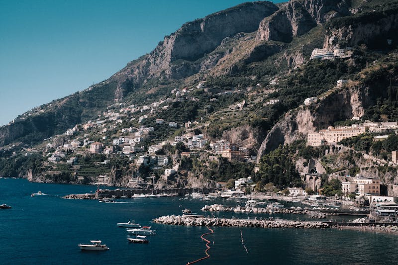 Aerial view of rocky Amalfi Coast cliffs with charming buildings