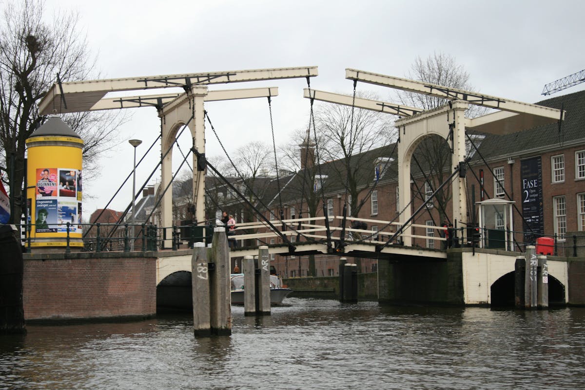 Historic drawbridge spanning Amsterdam canal