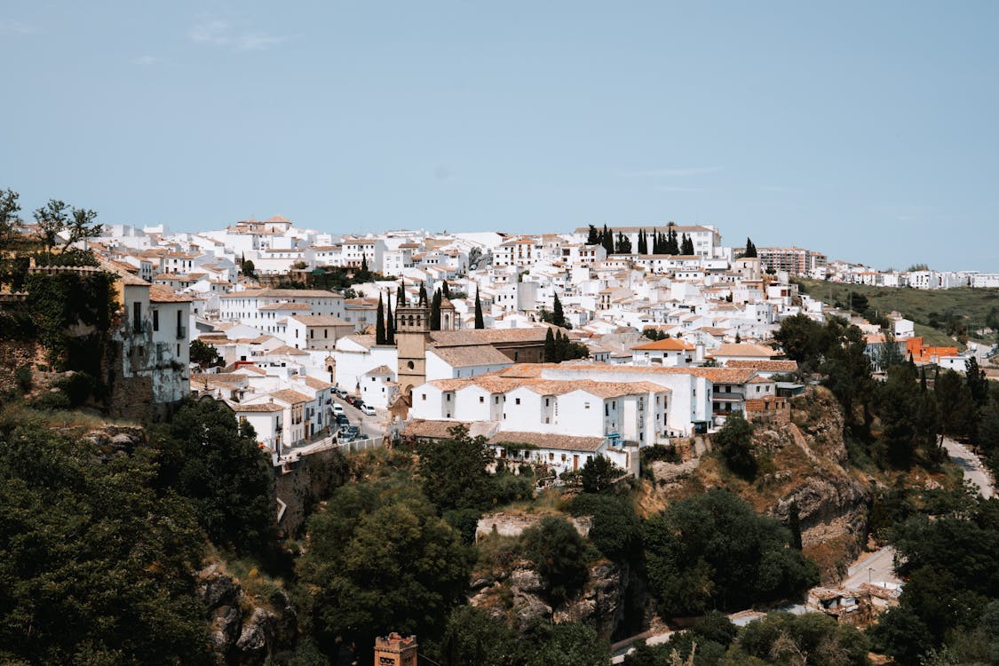Whitewashed buildings of Ronda with historic bridge
