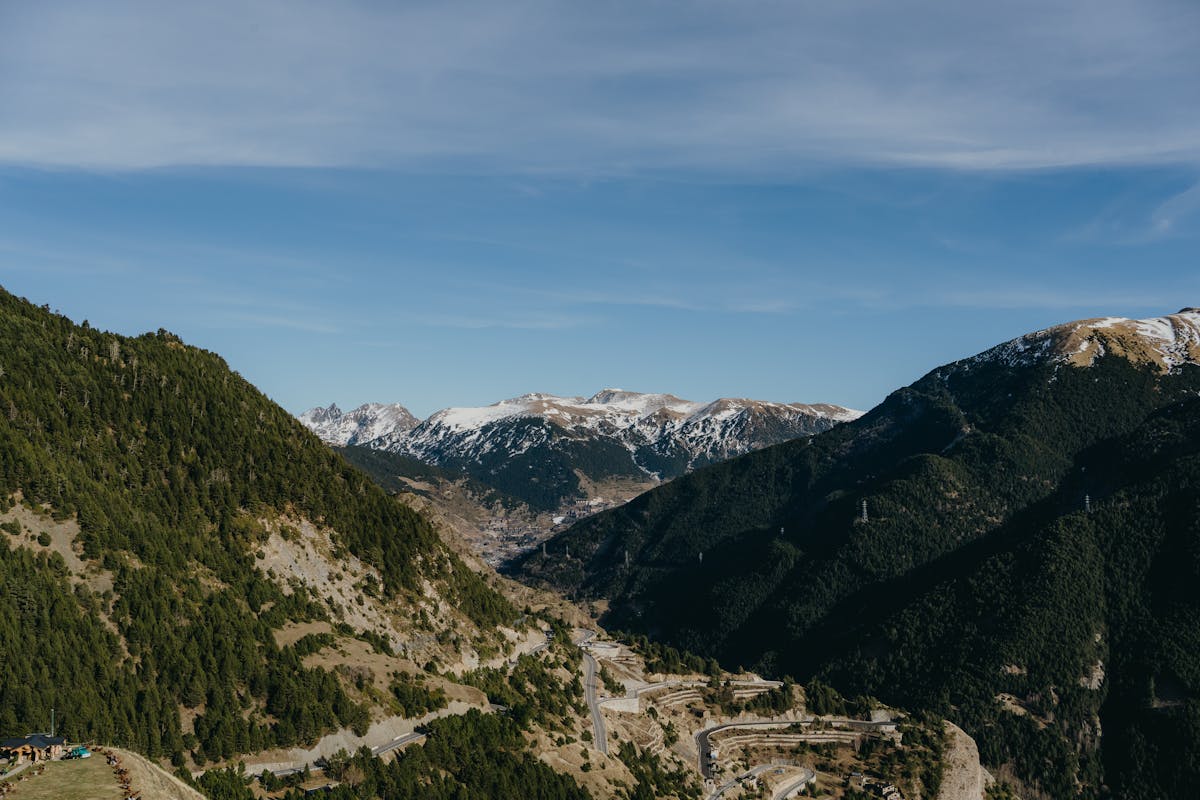 Winding mountain road cutting through the Pyrenees mountains in Andorra