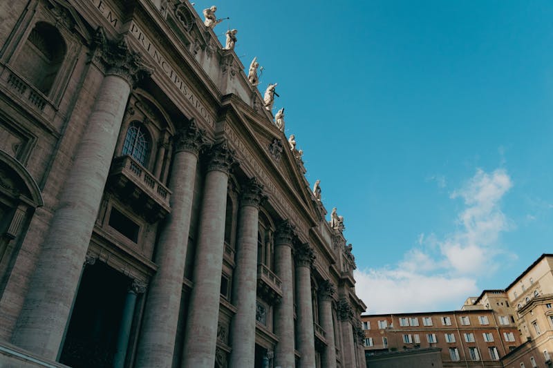 Bernini's bronze baldachin canopy inside St Peter's Basilica with the dome visible above