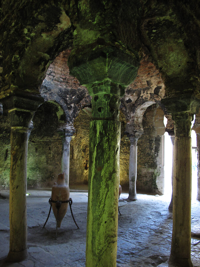 Horseshoe arches and columns inside the caldarium of the Arab Baths in Palma