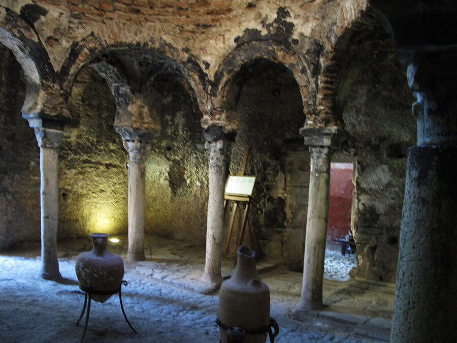 Interior of the 10th-century Arab Baths in Palma showing horseshoe arches and columns in the caldarium