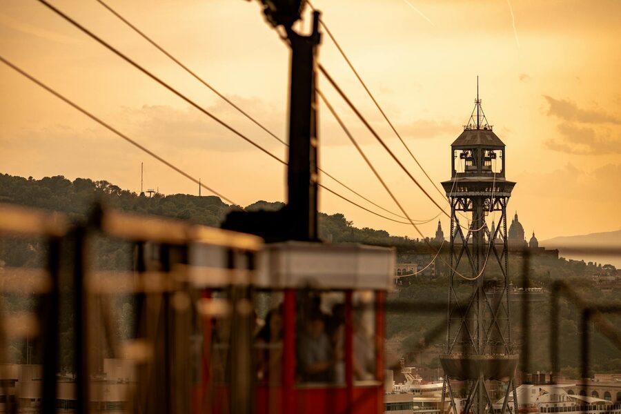 Scenic view of Barcelona cable car and Montjuic hill at golden hour