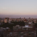 Aerial view of Barcelona skyline at twilight showing urban architecture and landmarks