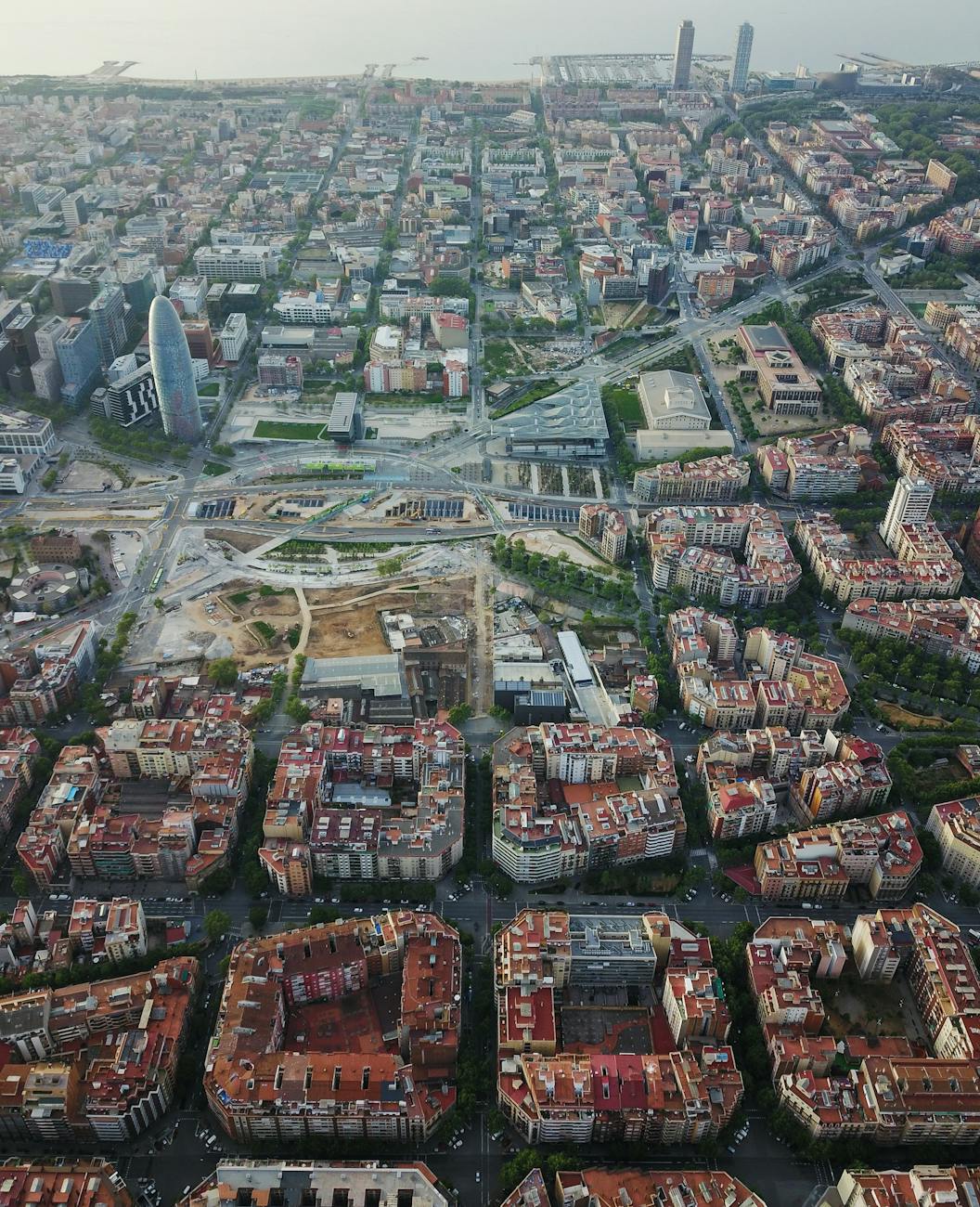Aerial view of Barcelona showing the famous Eixample grid pattern from above