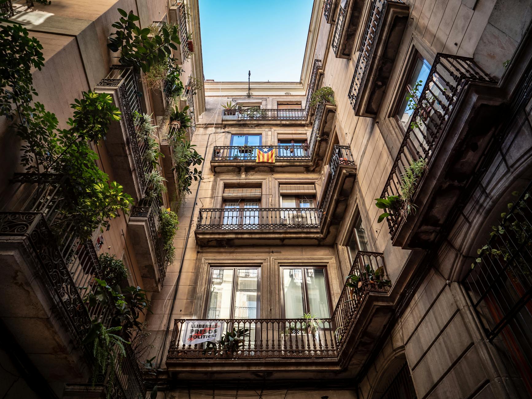 Historic Barcelona building with ornate balconies and ironwork