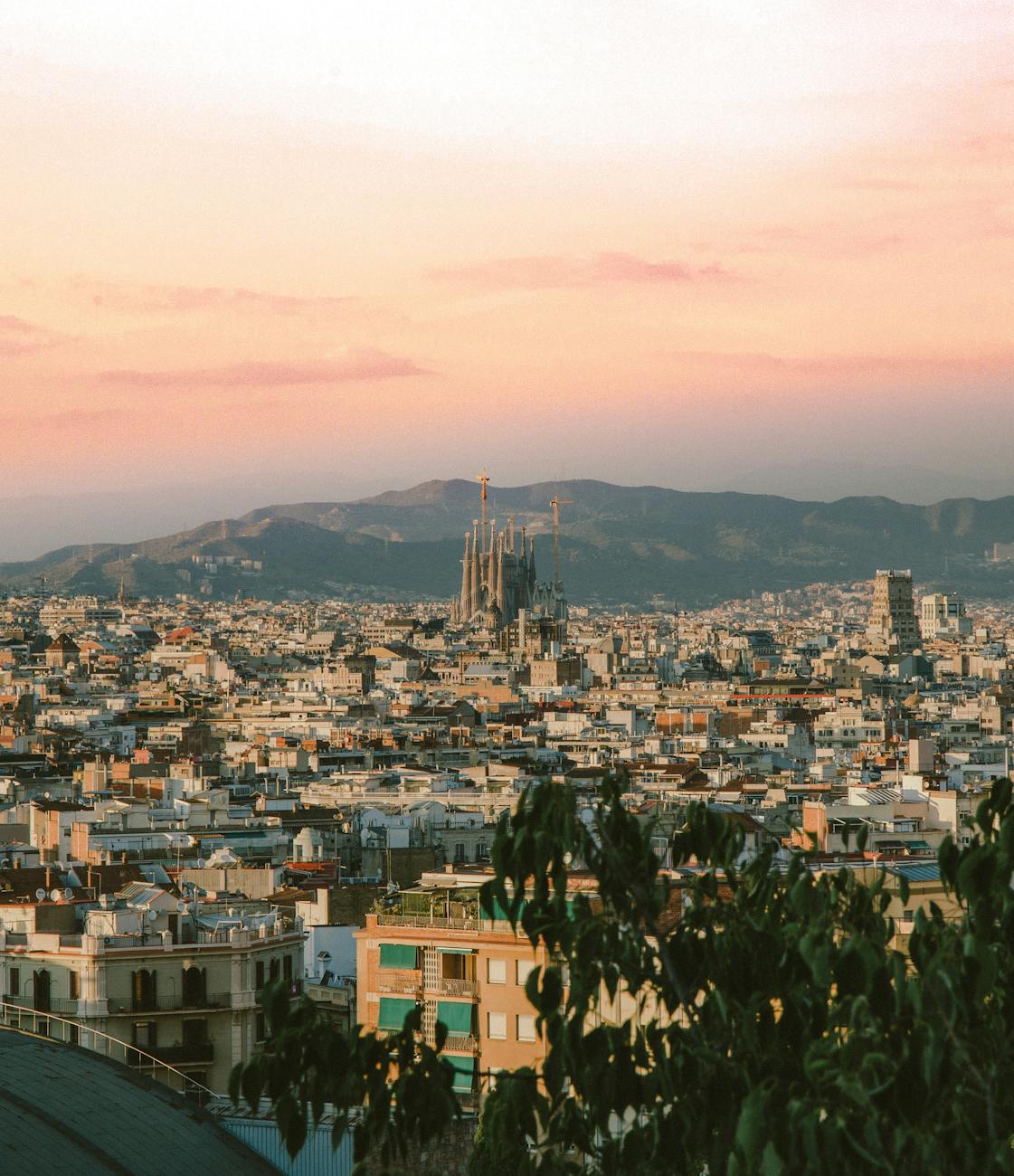 Aerial view of Barcelona with Sagrada Familia at golden hour