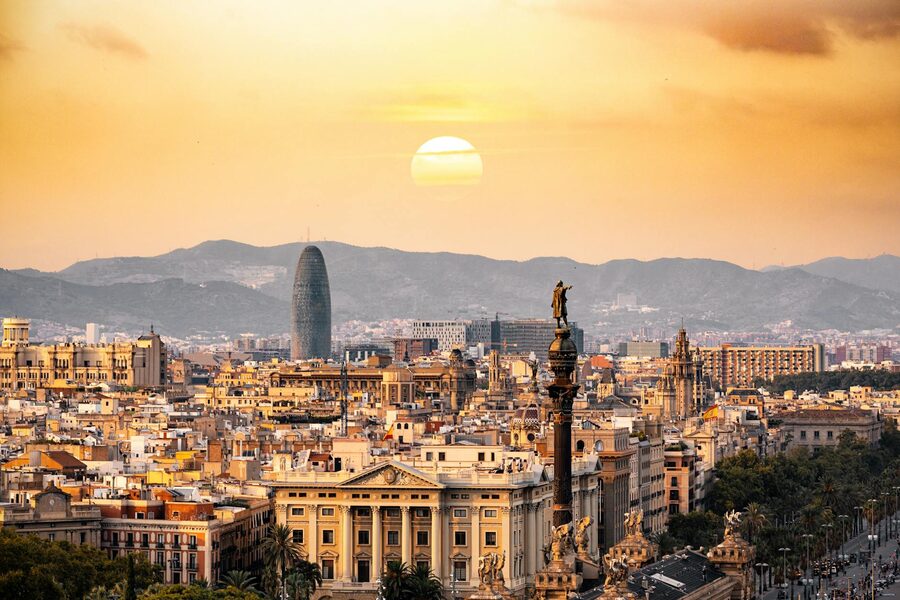Stunning sunset over Barcelona skyline from the castle ramparts