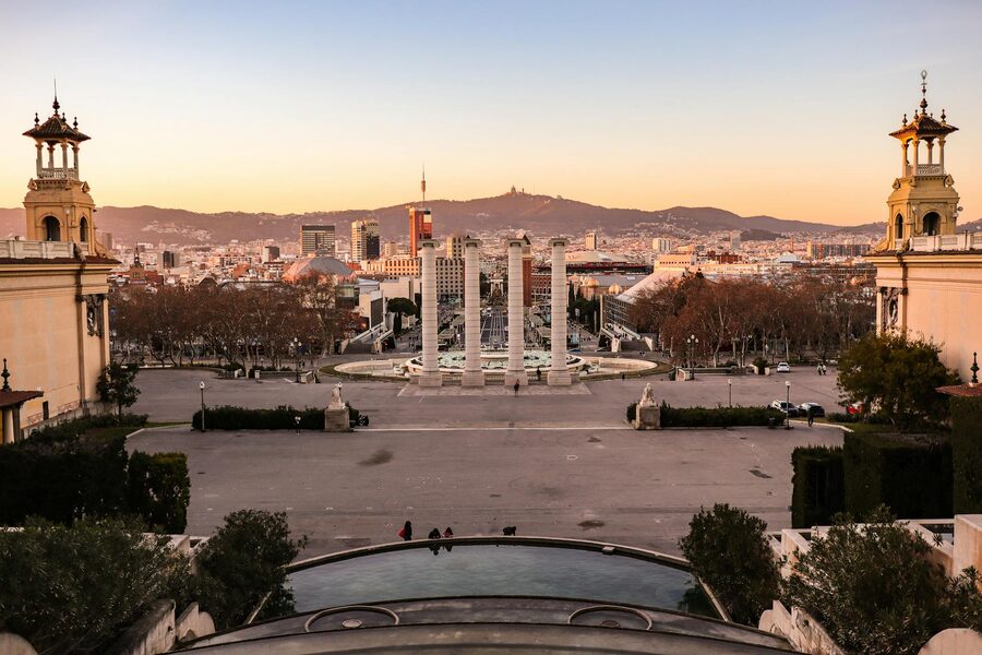 Beautiful sunset view over Barcelona cityscape from Montjuic with historic architecture