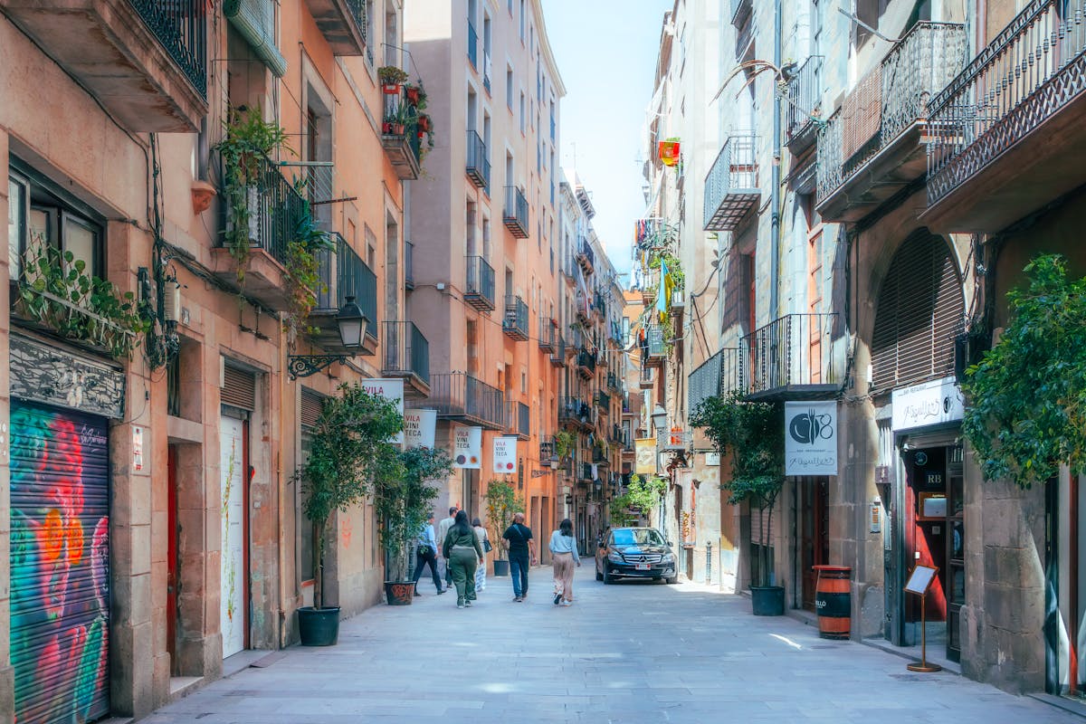 Narrow streets of the Gothic Quarter in Barcelona with pedestrians
