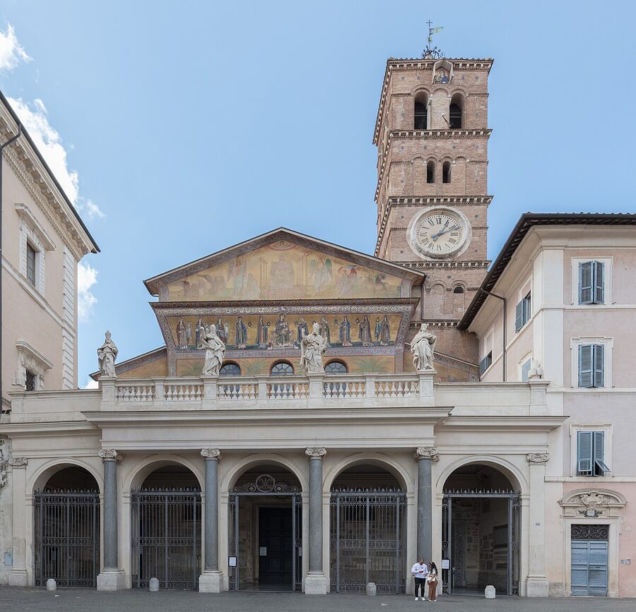The facade of the Basilica of Santa Maria in Trastevere with golden mosaics