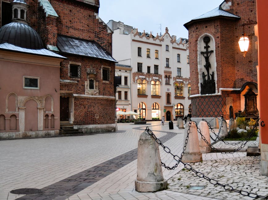 Historical charm of Kraków's Old Town featuring vintage brick buildings and cobblestone
