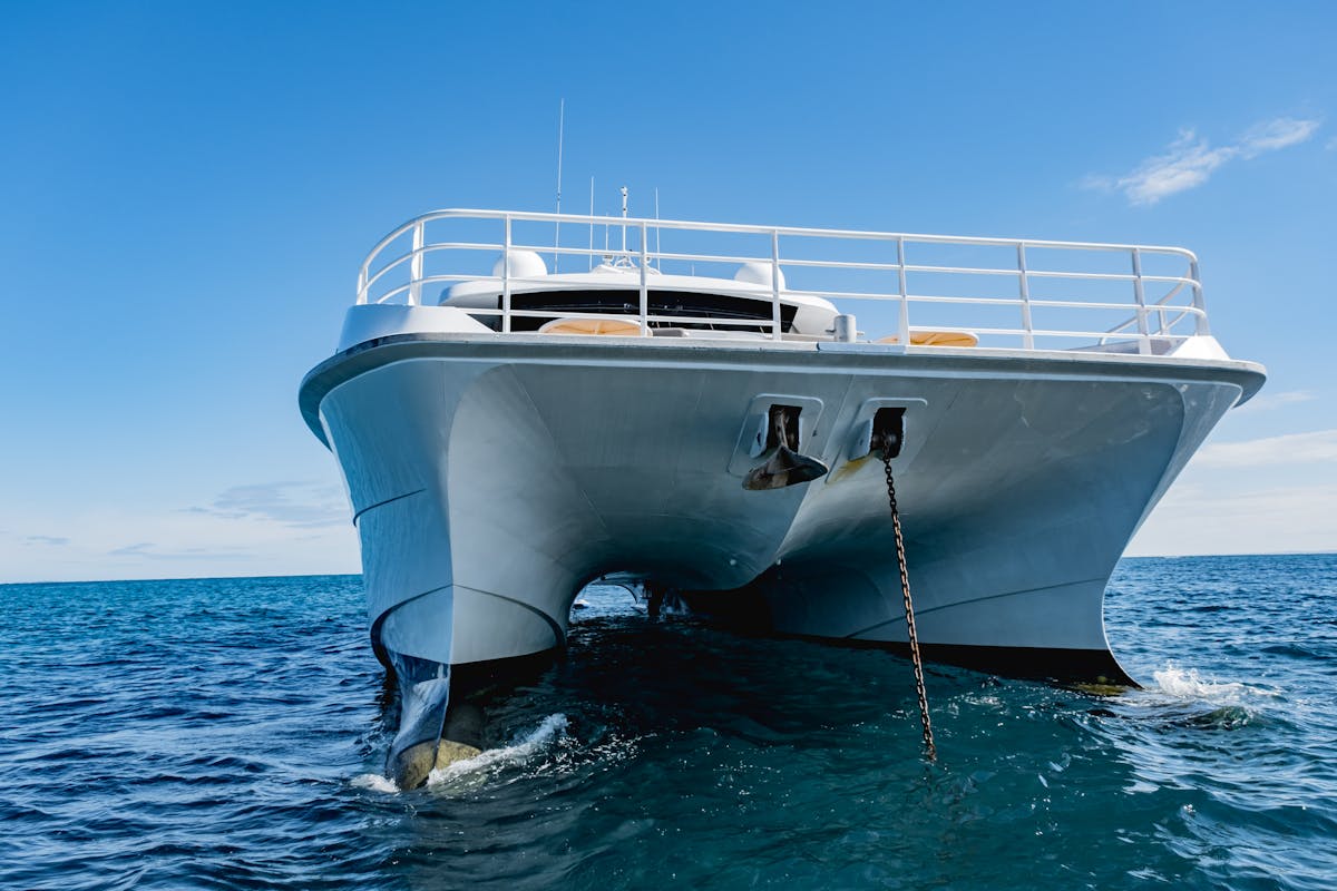 Low angle shot of yacht sailing on an ocean