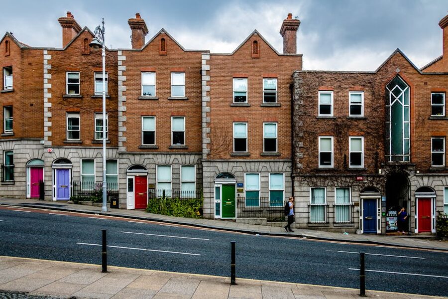 Colorful Georgian-style buildings line a street in Dublin, Ireland