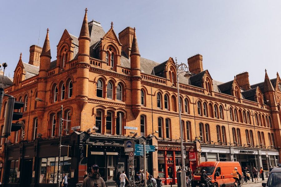A vibrant red brick building in Dublin city center, showcasing Victorian architecture