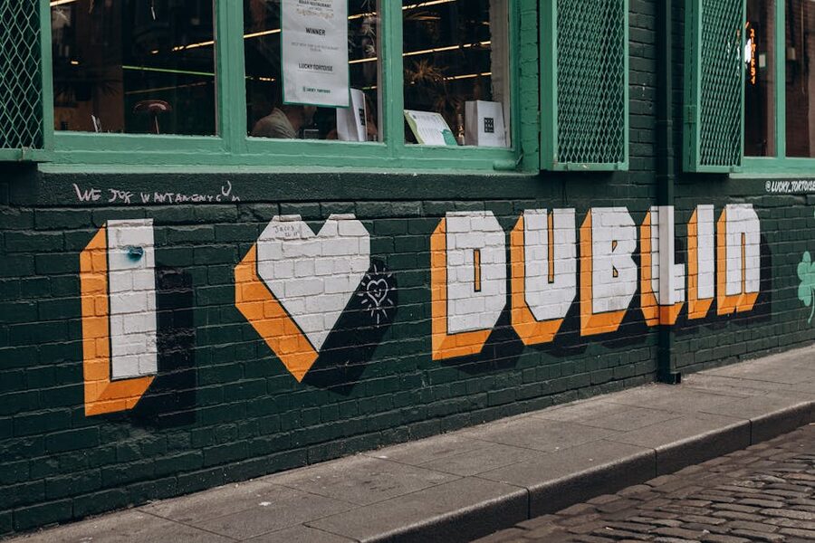 Colorful street art on a Dublin wall showcasing vibrant urban culture