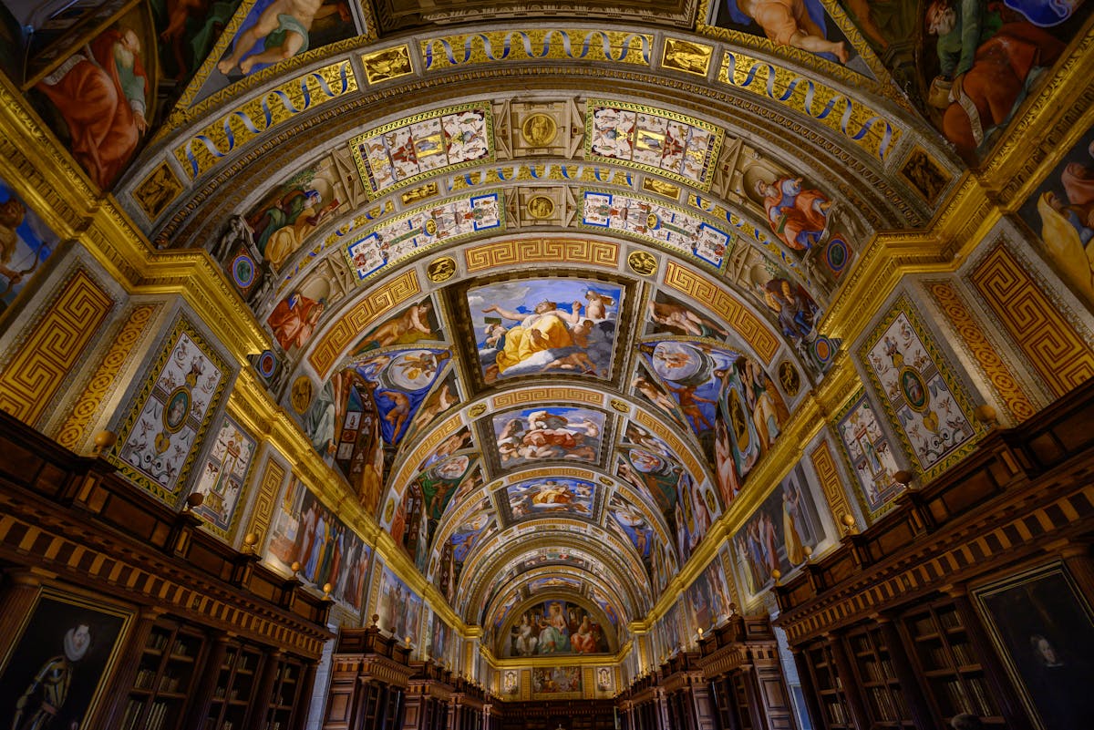 Intricate ceiling art of El Escorial Library in Spain