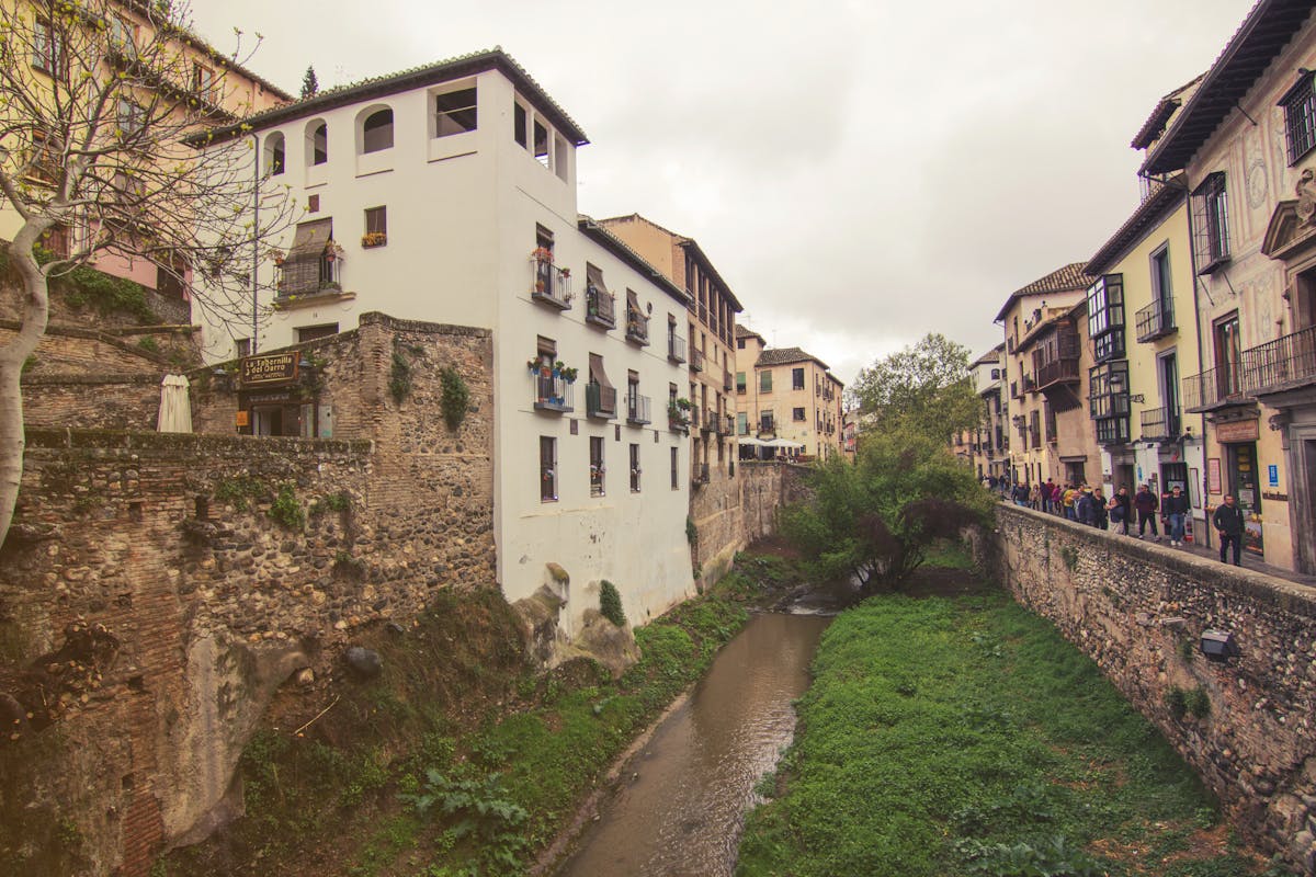 Water canal between houses in Granada Albaicin