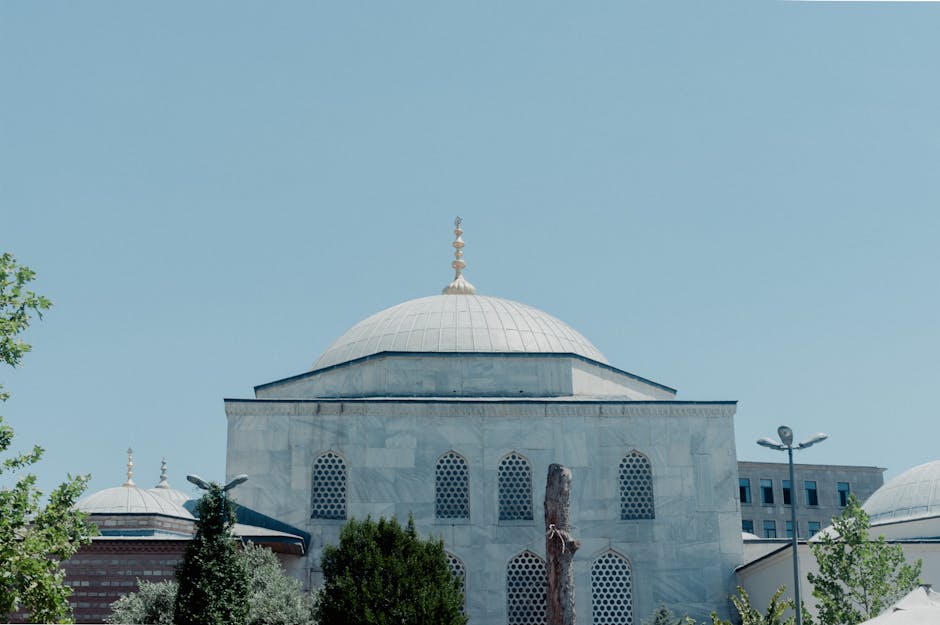 Marble mosque with dome in Istanbul on a clear sunny day