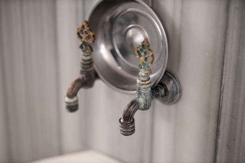 Ornate faucets in Turkish hammam showcasing traditional design and craftsmanship